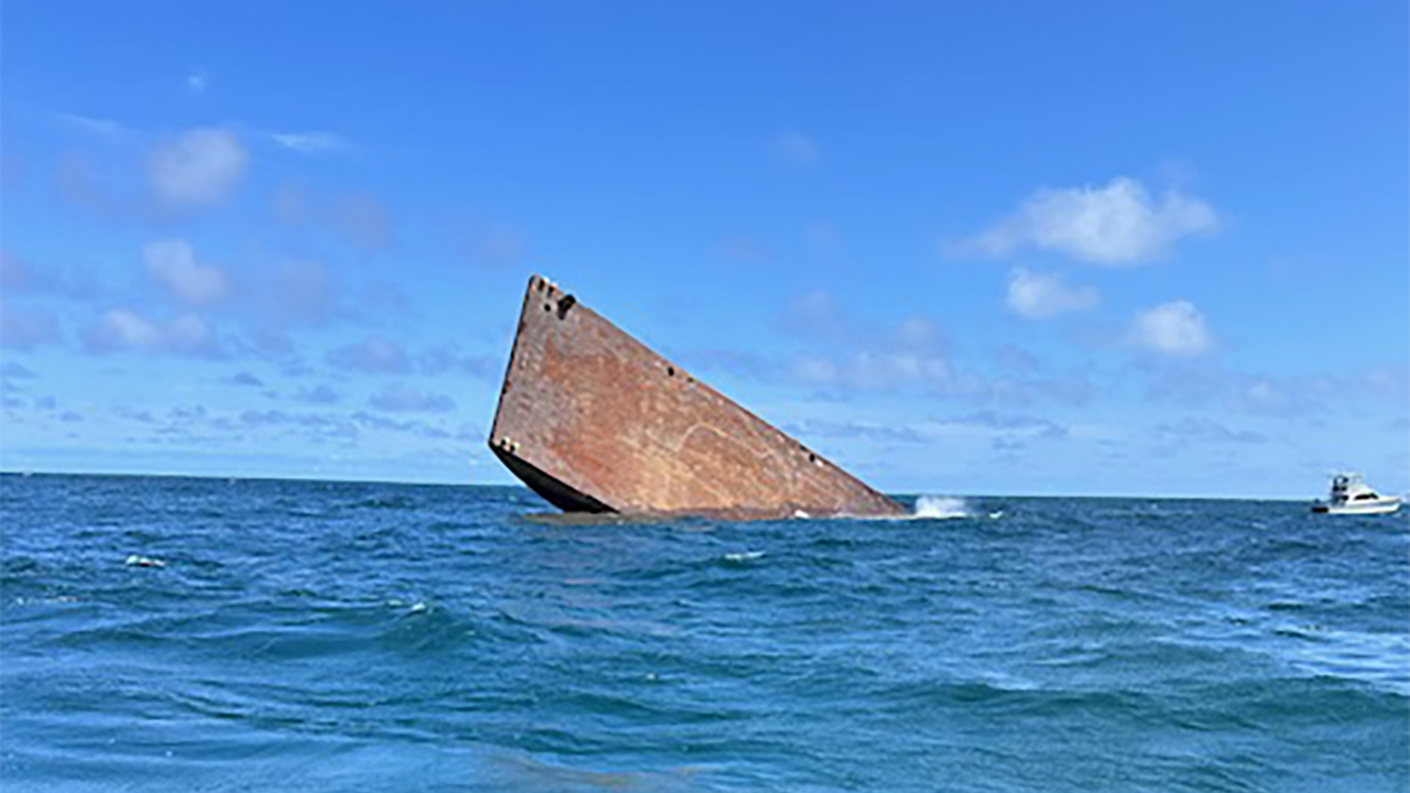 NJDEP| Fish & Wildlife | Barge Deployment on the Little Egg Inlet Reef